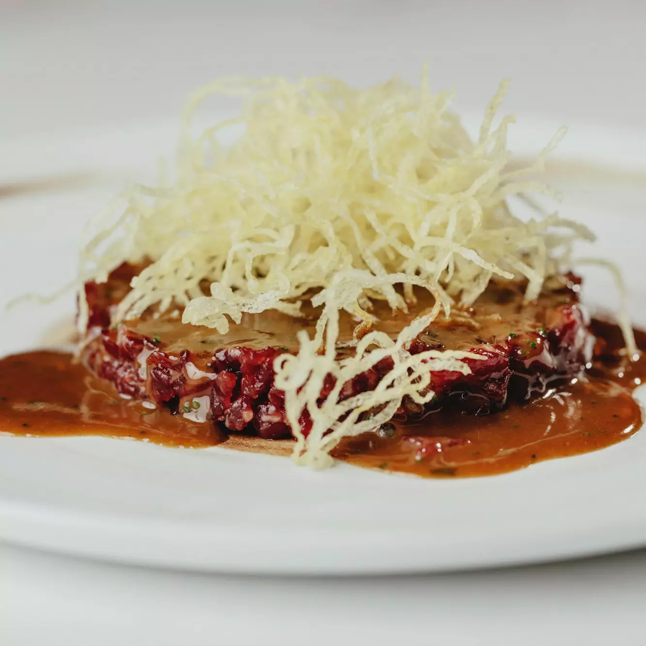 An ‘Dani’s Burger Rossini’ le seanbhó agus rún na hIbéire le foie gras